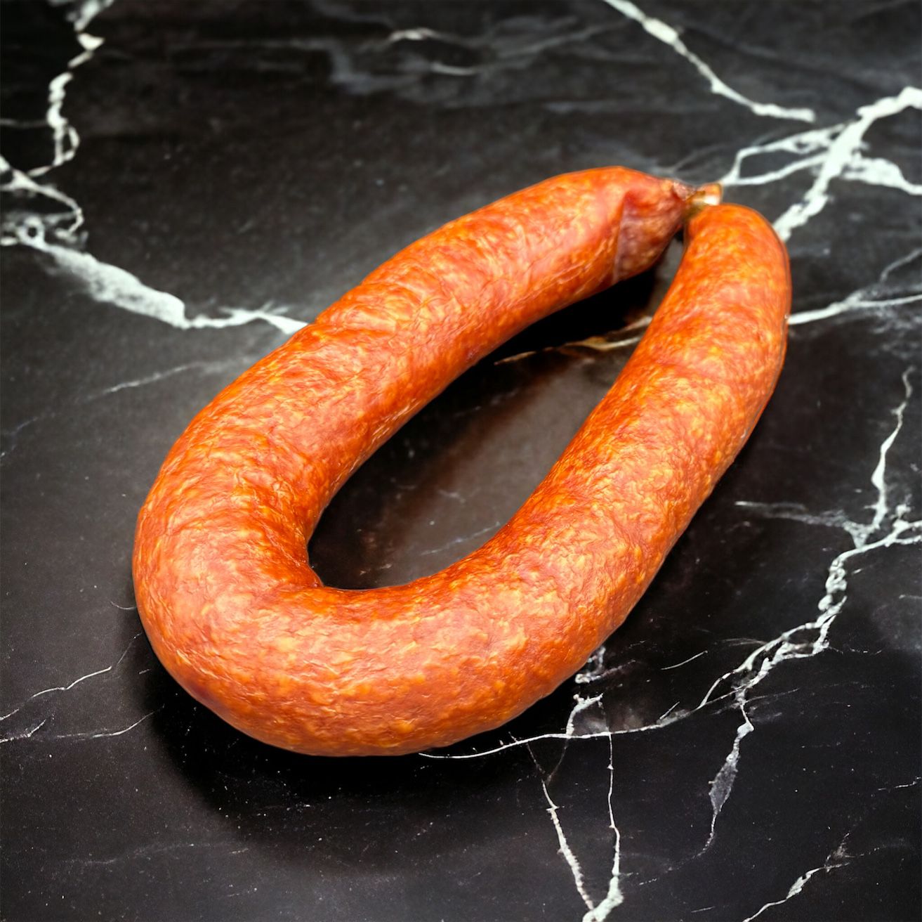 Order house salami in a ring from DerHolzapfel FLEISCH now. ENJOYMENT ...